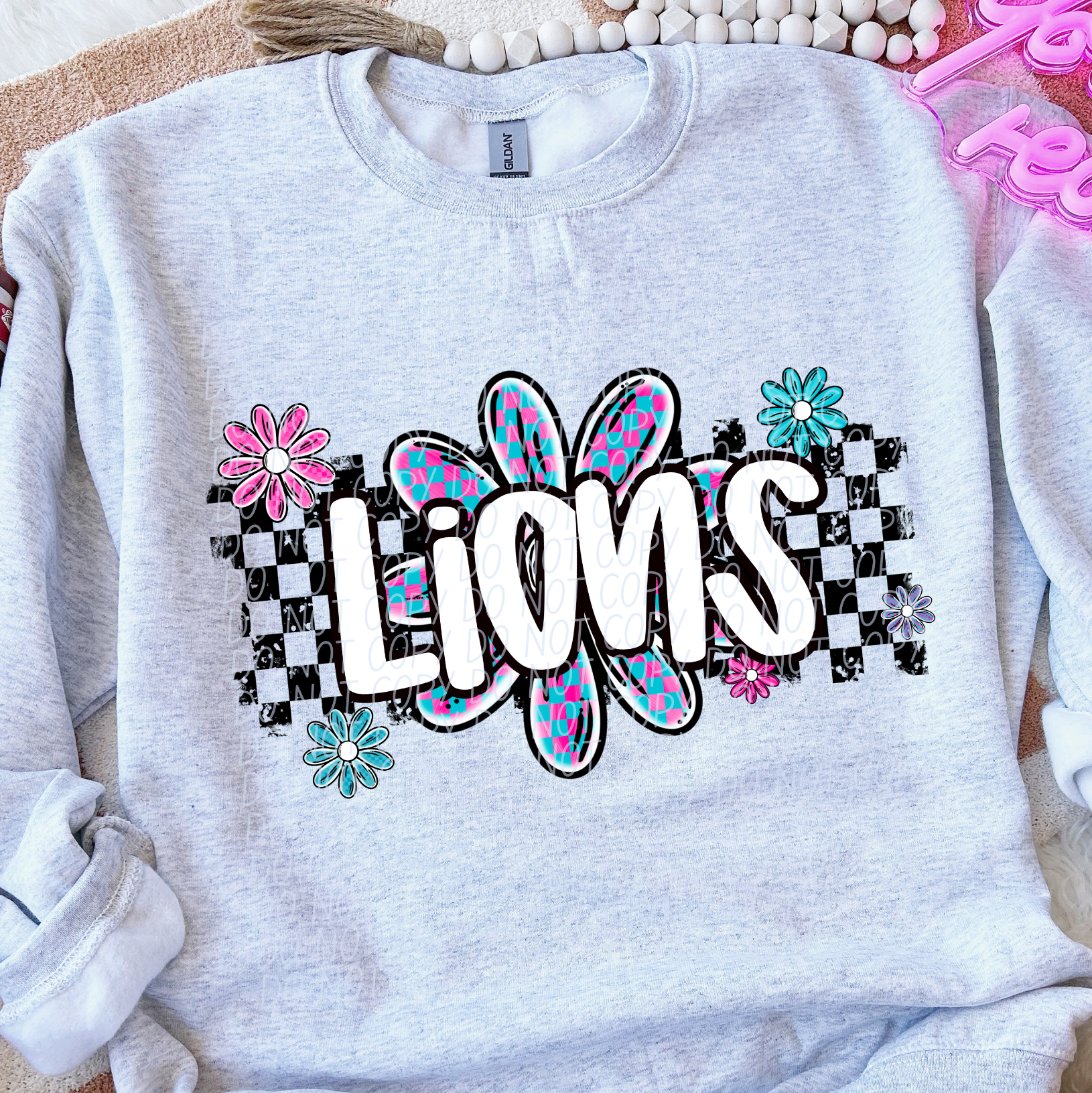 Lions (checker flower mascots) – trendyteesbyleslie